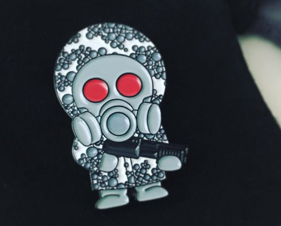 GASSED S001 Lapel Pin – Plastic and Plush
